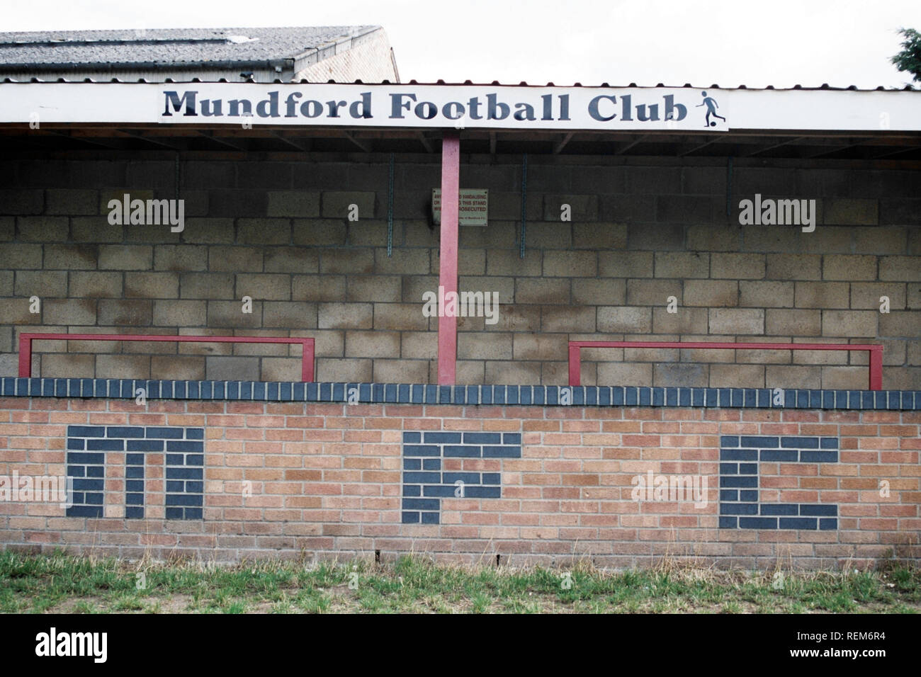 Covered area and dugouts at Mundford FC Football Ground, The Glebe, St ...
