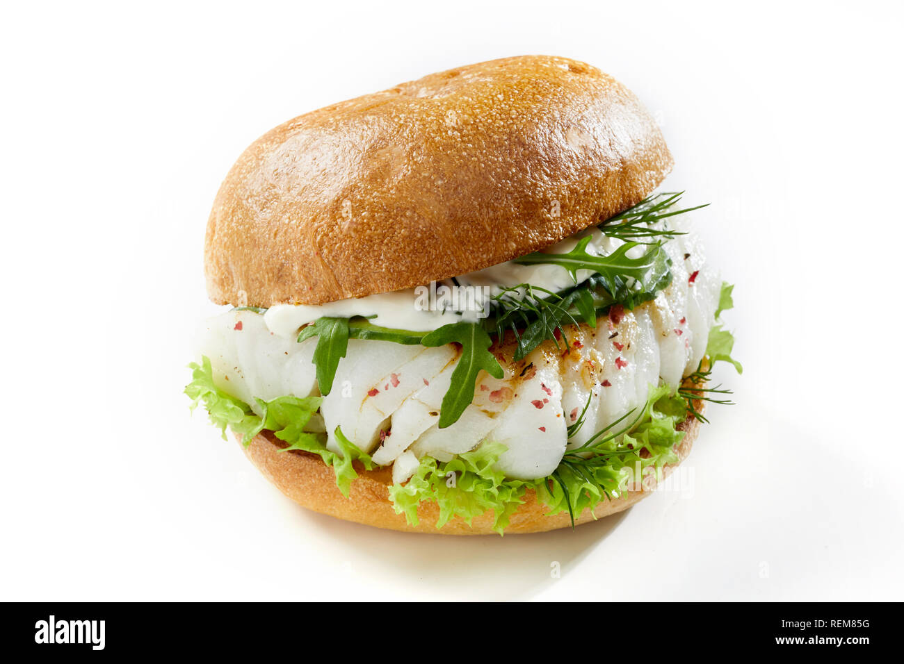 seafood cod fish with salad and mayonnaise isolated against white ...