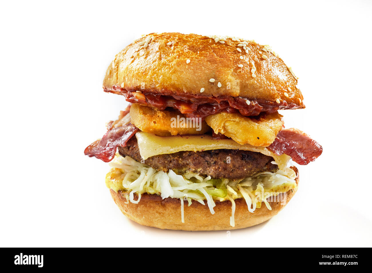 Isolated surf and turf burger with seafood and meat on a toasted bun ...