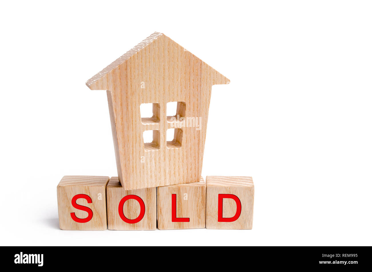 wooden house with the inscription sold on white isolated background ...