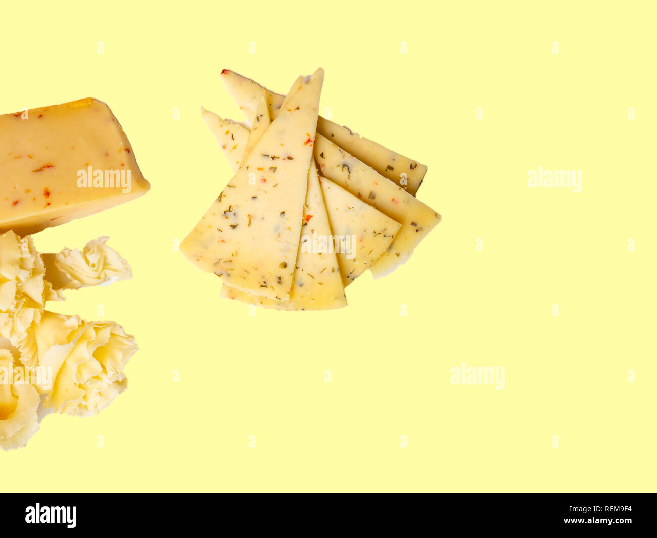 Different cheeses on yellow background Fresh dairy products Stock Photo ...