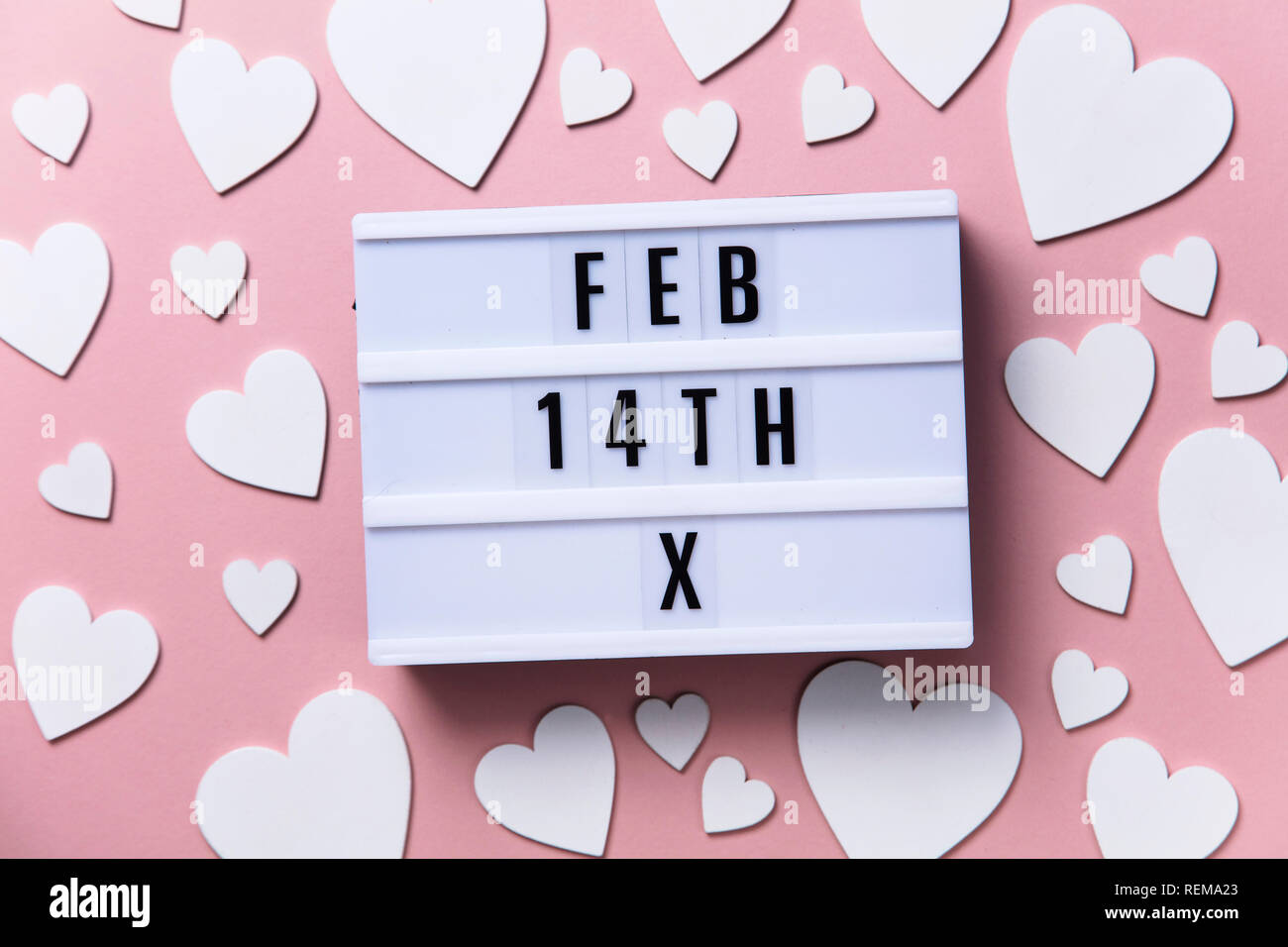 Feb 14th lightbox message with white hearts on a pink background Stock ...