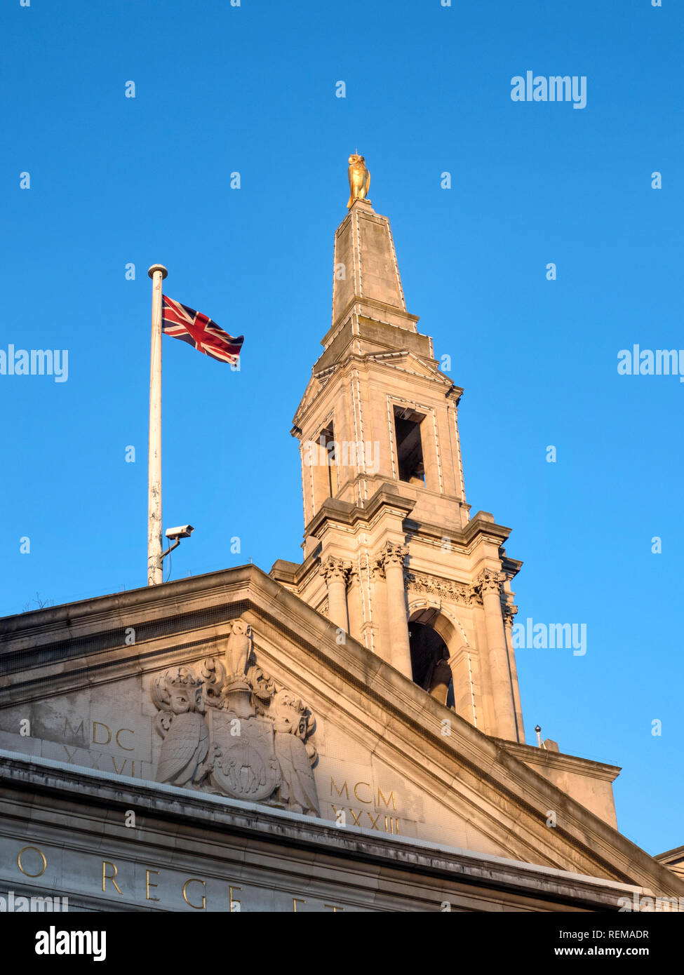 Union flag flying in winter afternoon light on the Civic Hall at Leeds ...