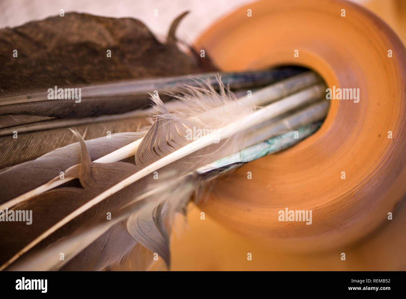 Feather pen in clay inkwell. Medieval, vintage, retro background ...