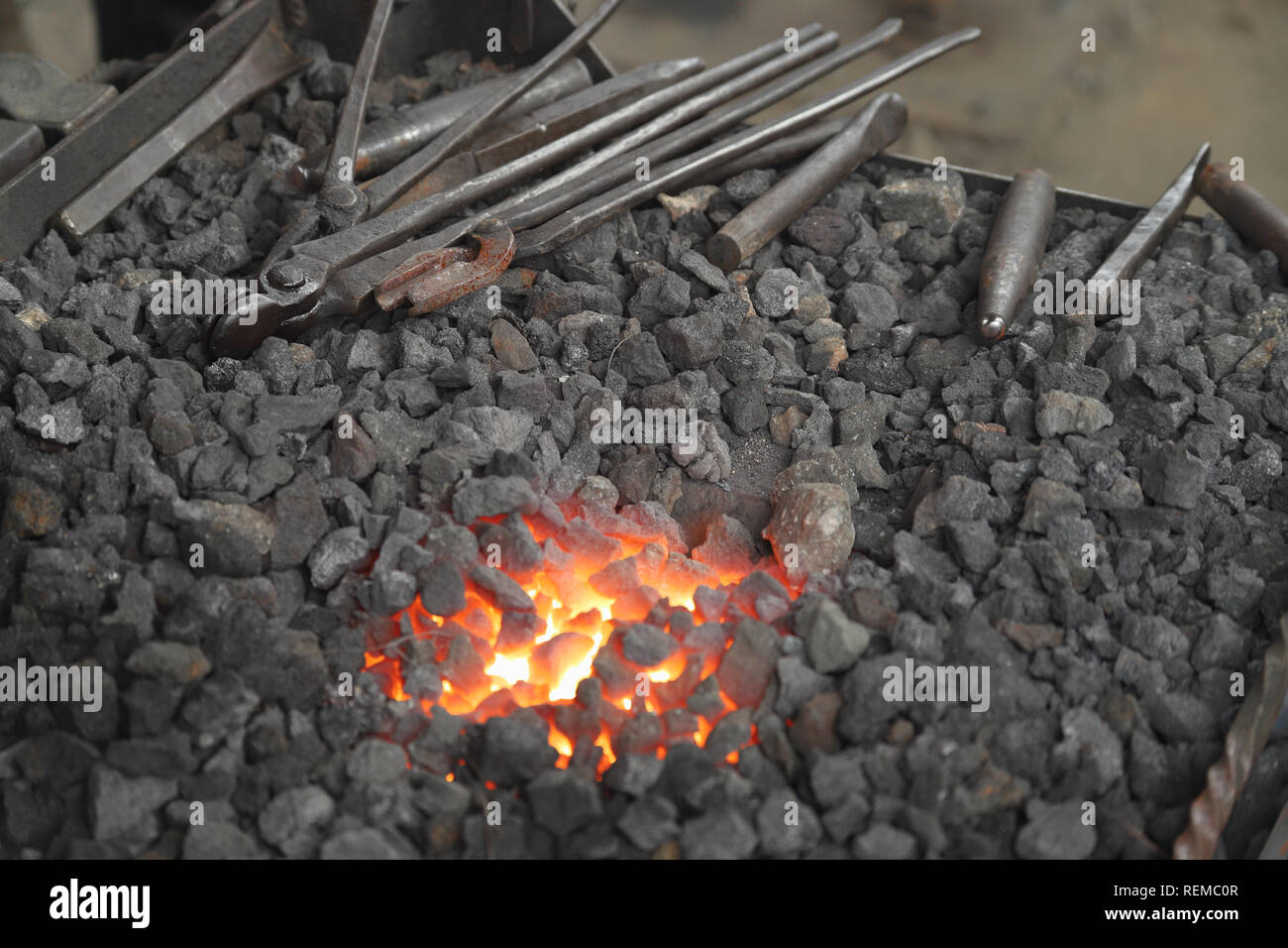 Blacksmith forge with tools Stock Photo - Alamy