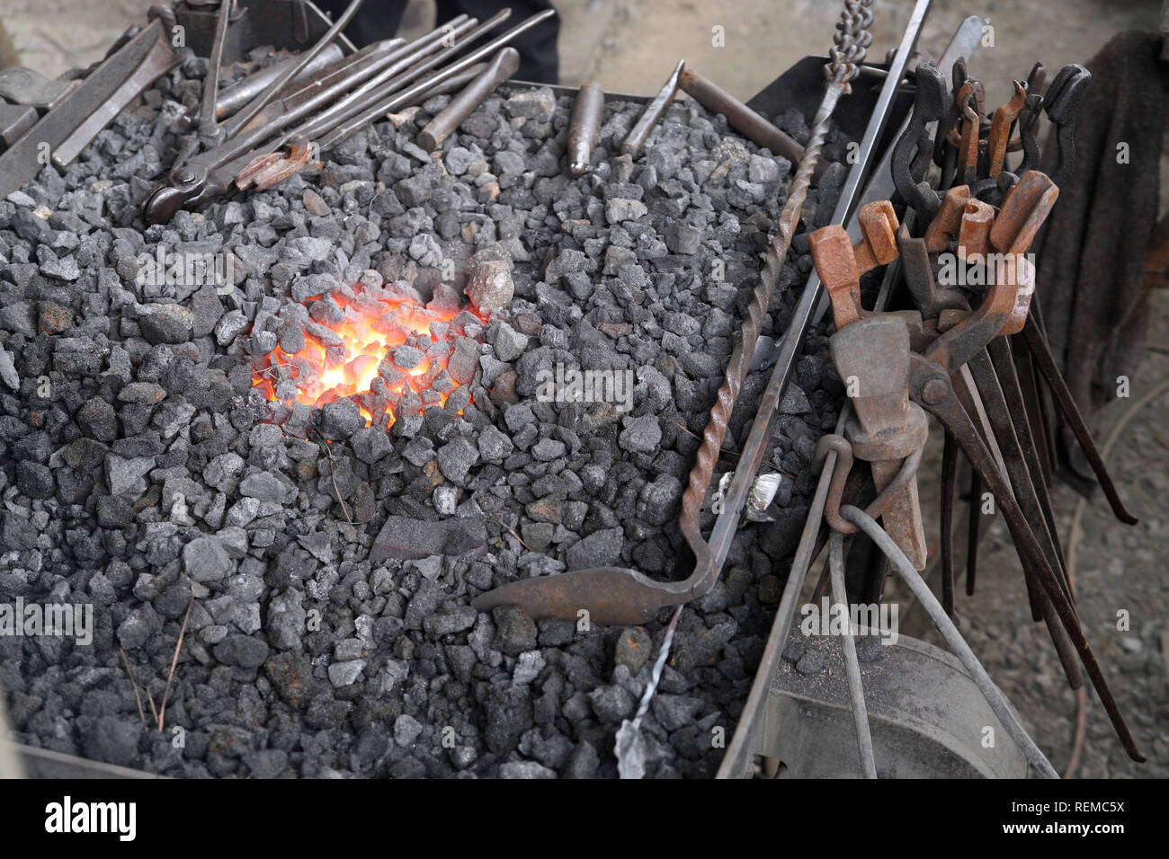 Blacksmith forge with tools Stock Photo - Alamy