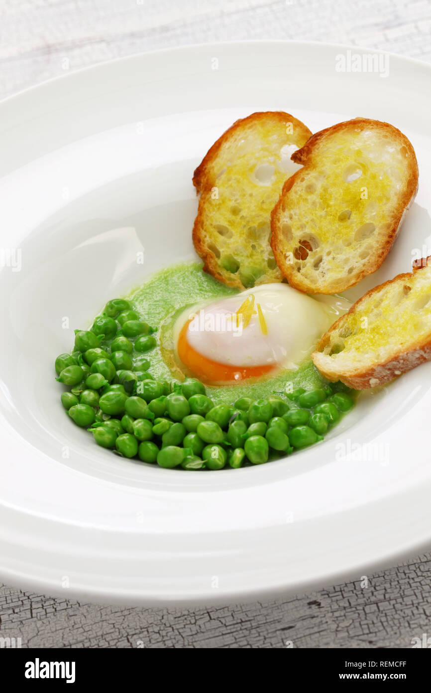 tear peas with poached egg, spanish basque cuisine Stock Photo - Alamy