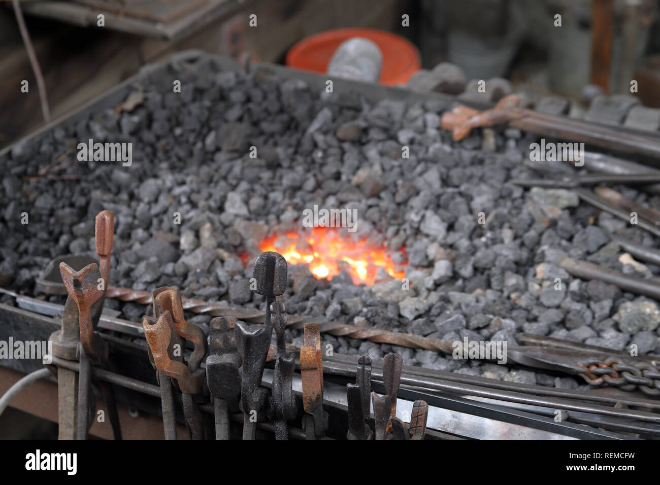 Blacksmith forge with tools Stock Photo - Alamy
