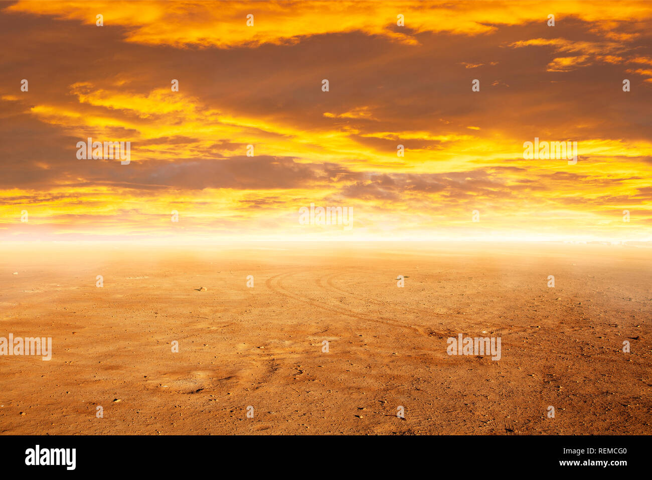 Desert sand under a sunset sky Stock Photo - Alamy