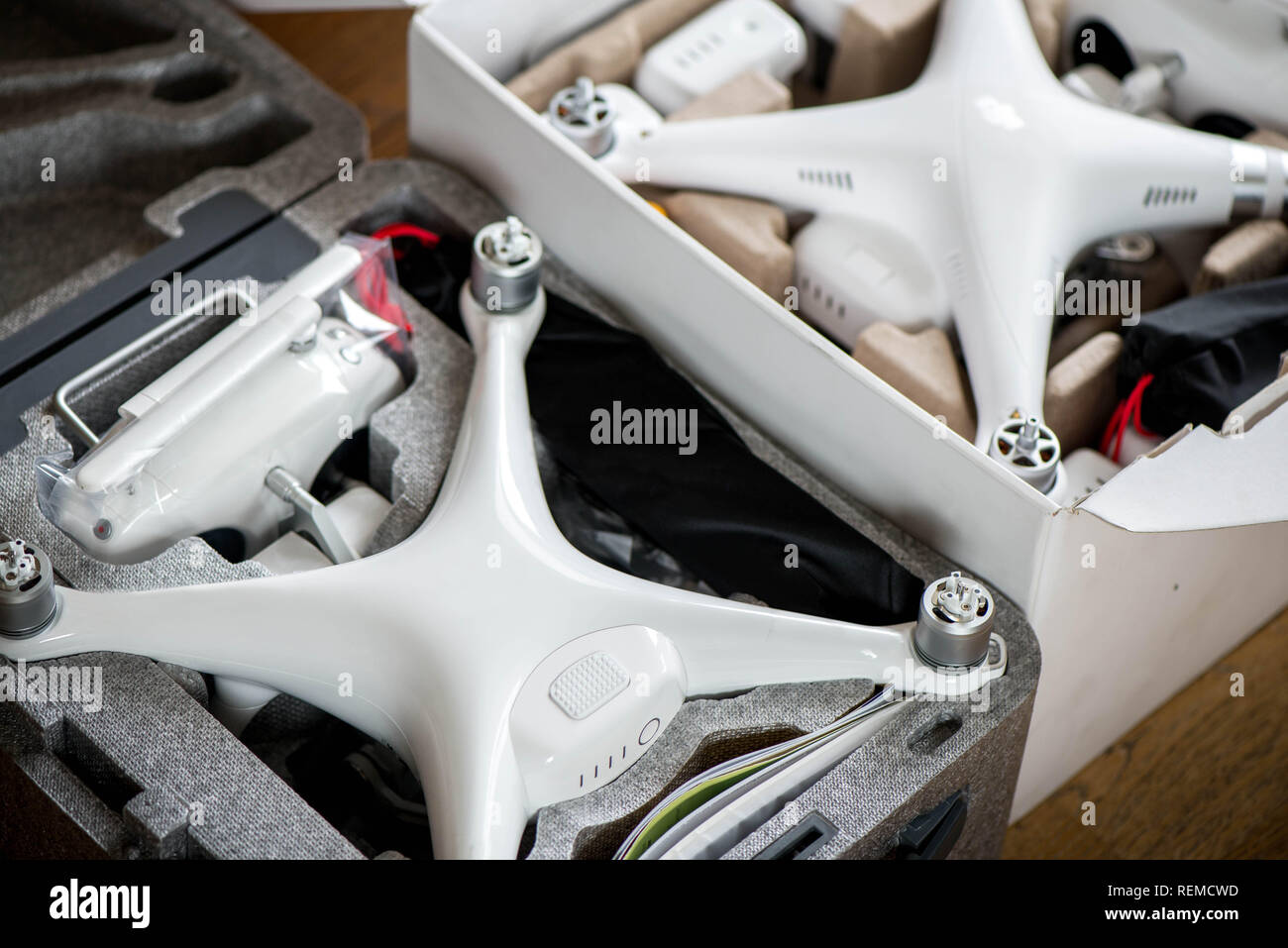 Two brand new unboxed drones in carry boxes. Concept of rapid ...