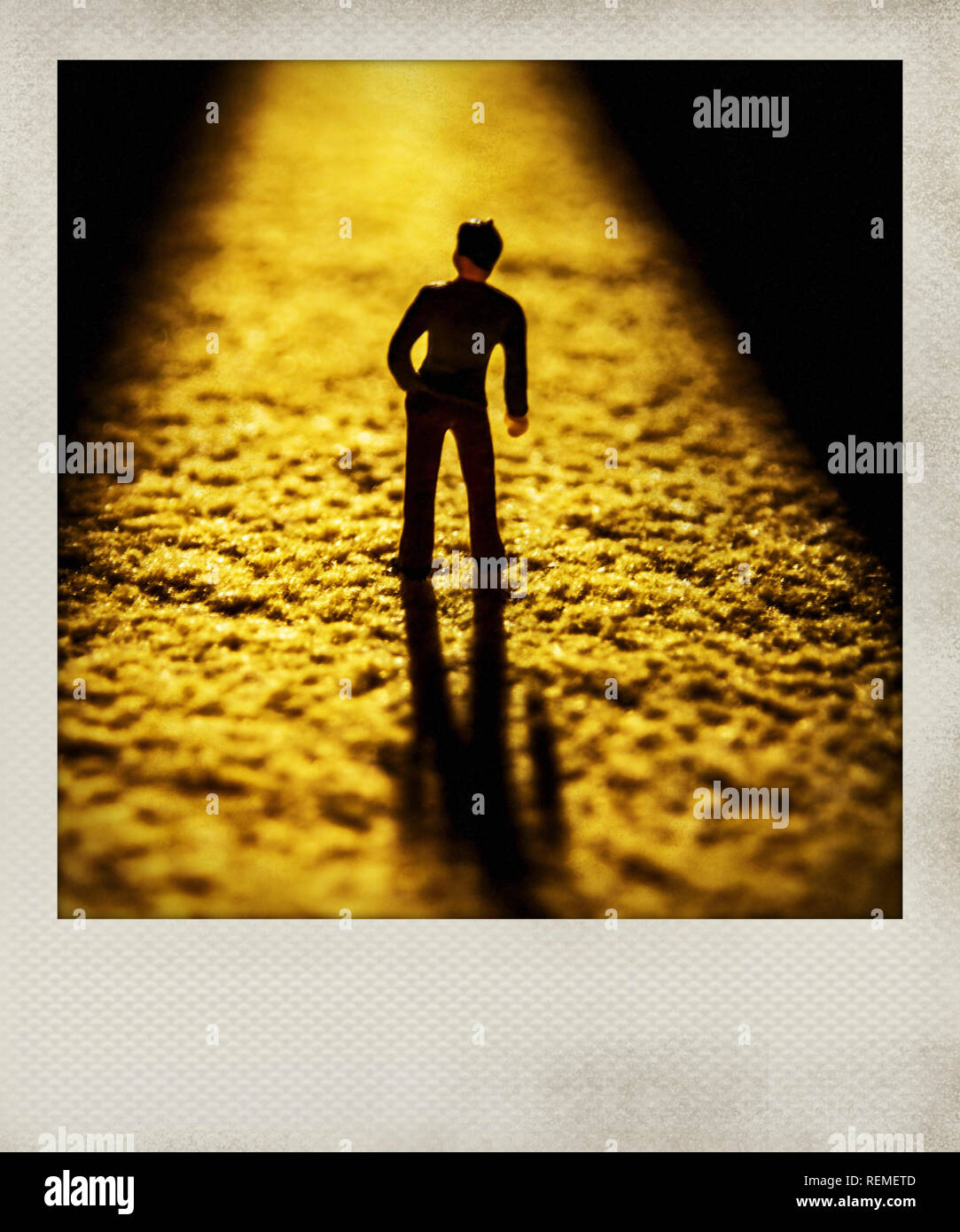 Polaroid effect of figurine and light Stock Photo - Alamy