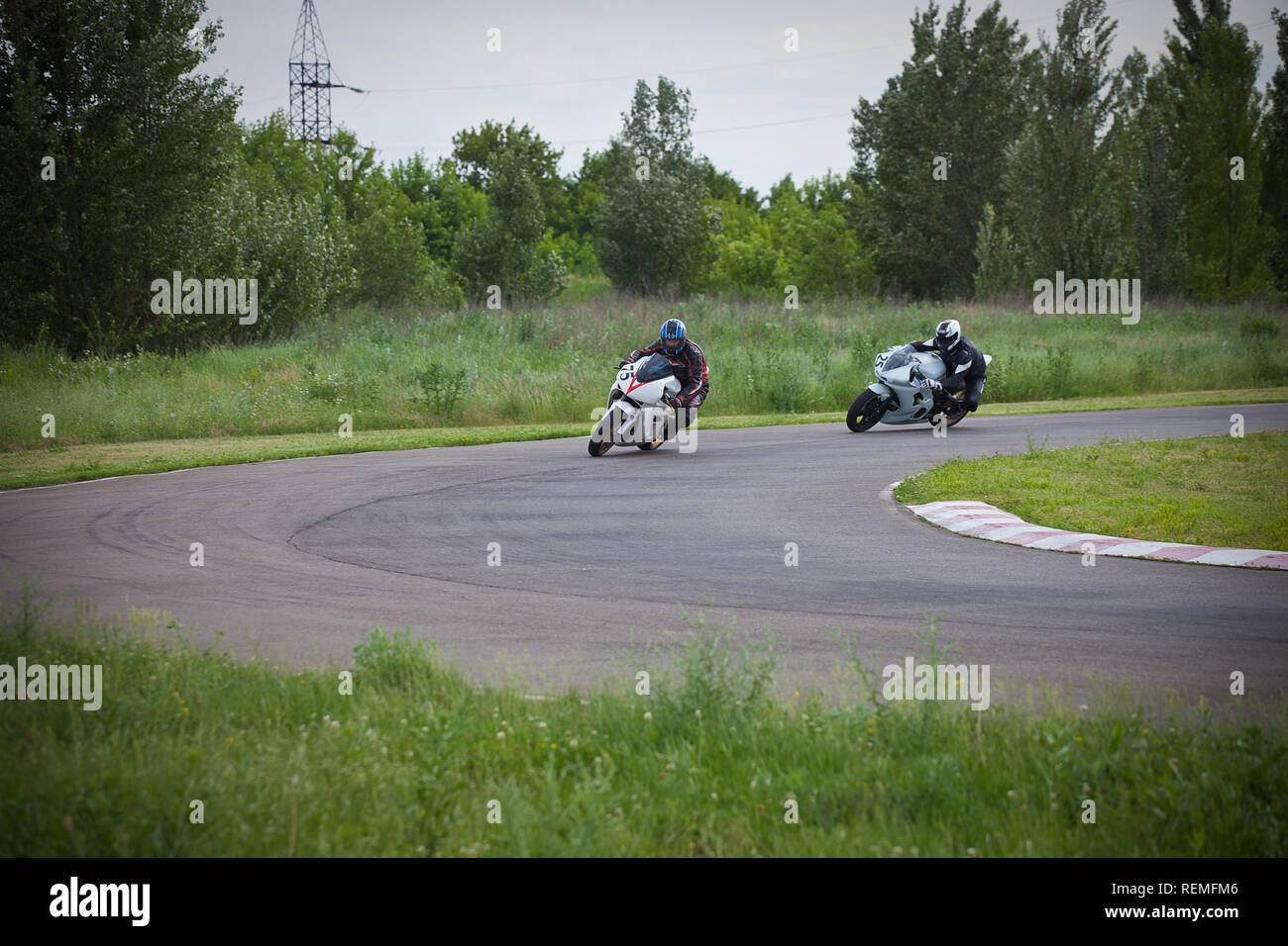 Race between two motorcycle athletes. Motorcycle sport. FIM Road Racing ...