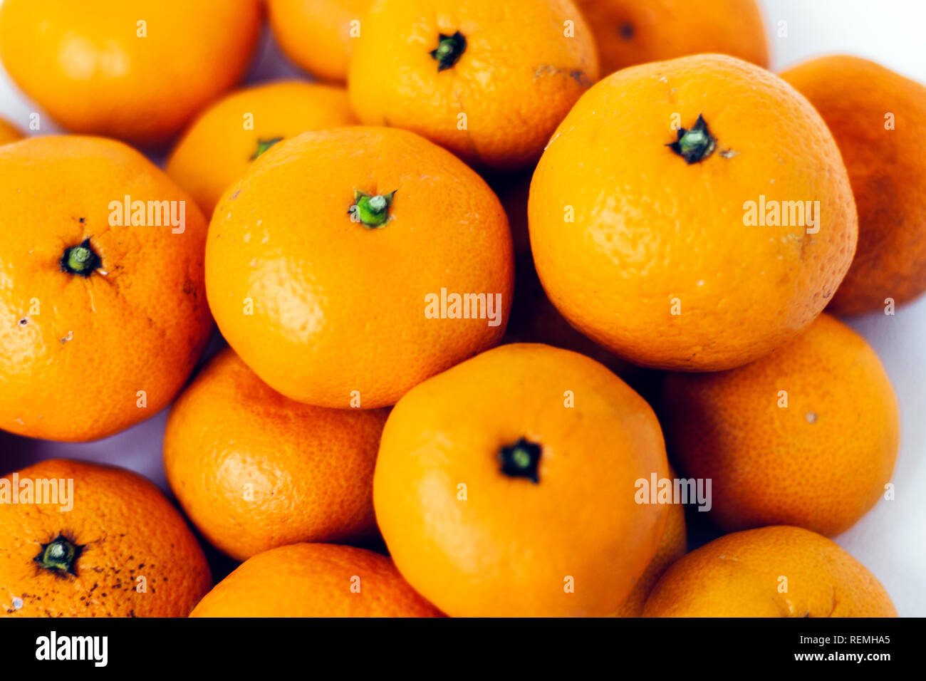 Fresh whole mandarin oranges background , top view Stock Photo - Alamy
