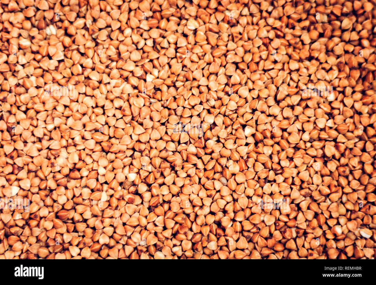 Dry raw buckwheat grains background texture vegetarian concept Stock ...