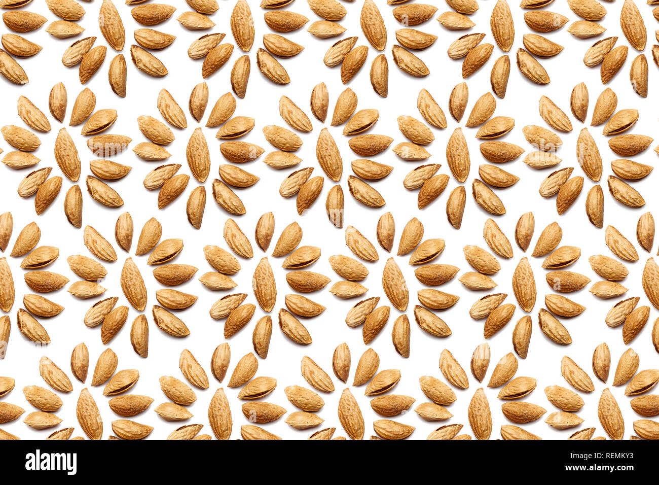 Pattern of Nuts - peeled almonds Badam on a white background in the ...
