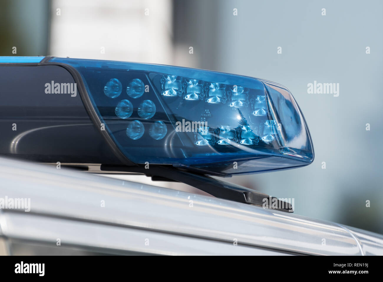 Detail shot of a blue light on a police car on the street Stock Photo ...