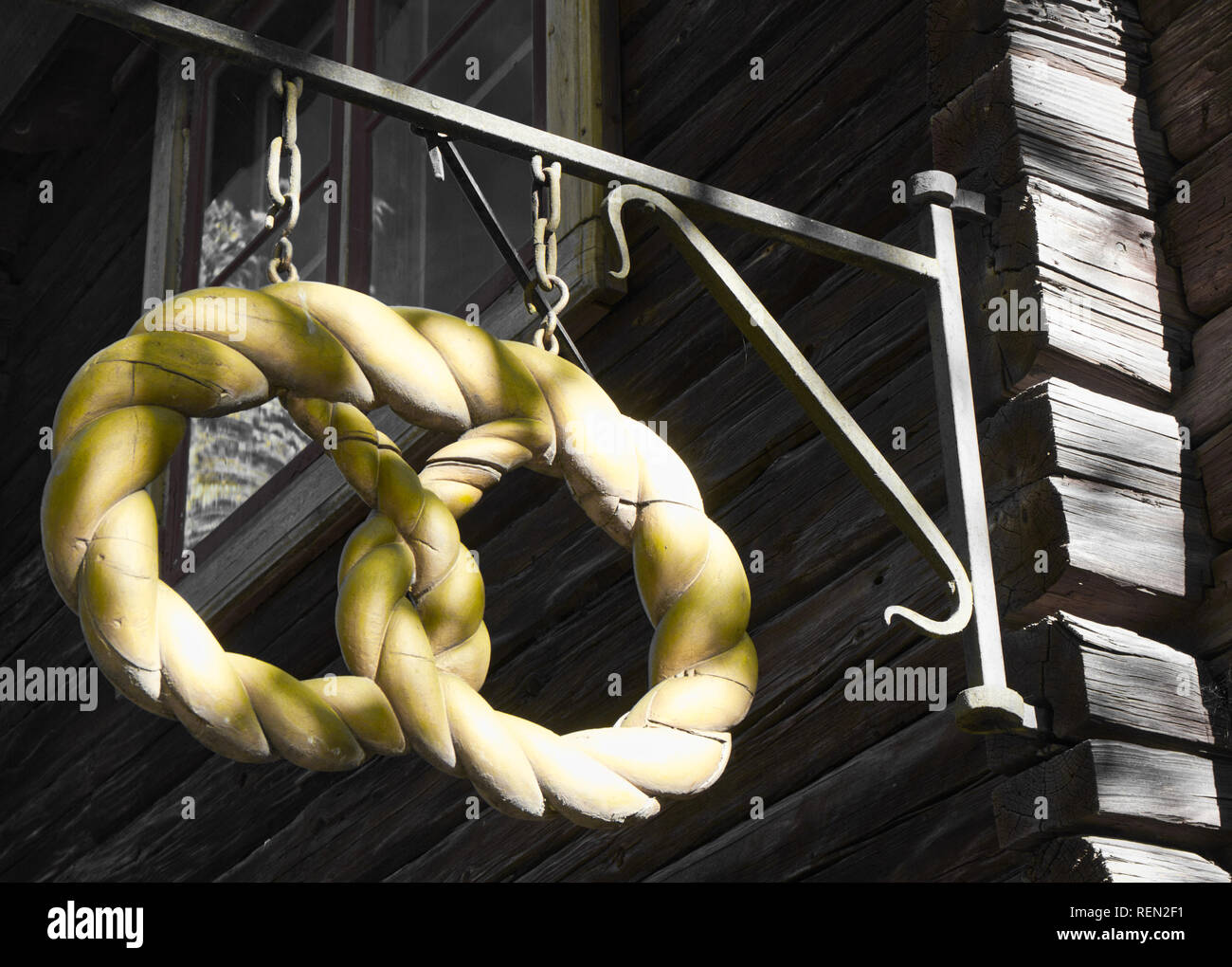 Gilded wooden pretzel hanging outside the Bakery (Bageriet), Skansen ...