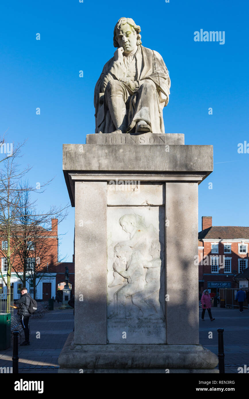 Large stone statue of Samuel Johnson in the Market Square in Lichfield ...