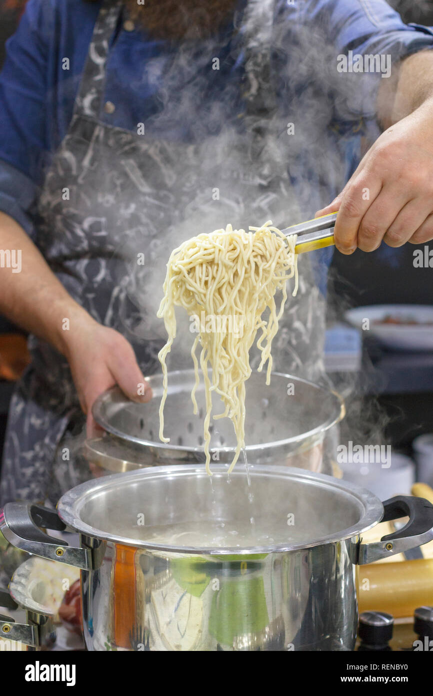 Fresh noodles chinese making chef hi-res stock photography and images ...