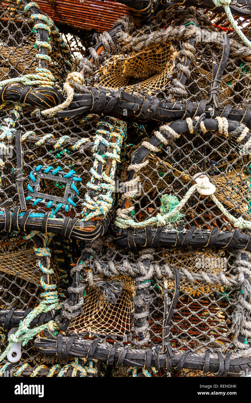 Lobster Pots and rope stacked on Harbour Quayside ready for loading on ...