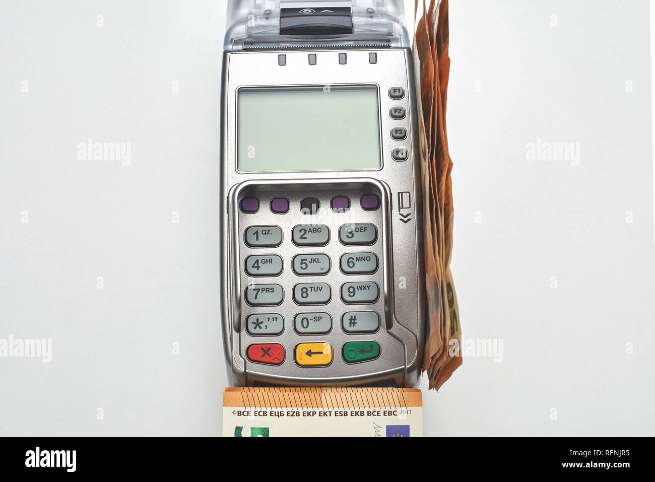 Credit card reader with money.Electronic money and cash Stock Photo - Alamy