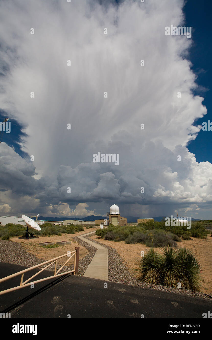 A thunderstorm with an extensive anvil cloud develops over El Paso ...