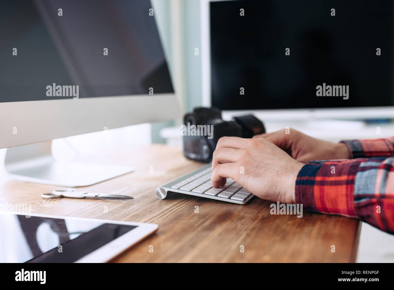 Man programming working on computer hi-res stock photography and images ...