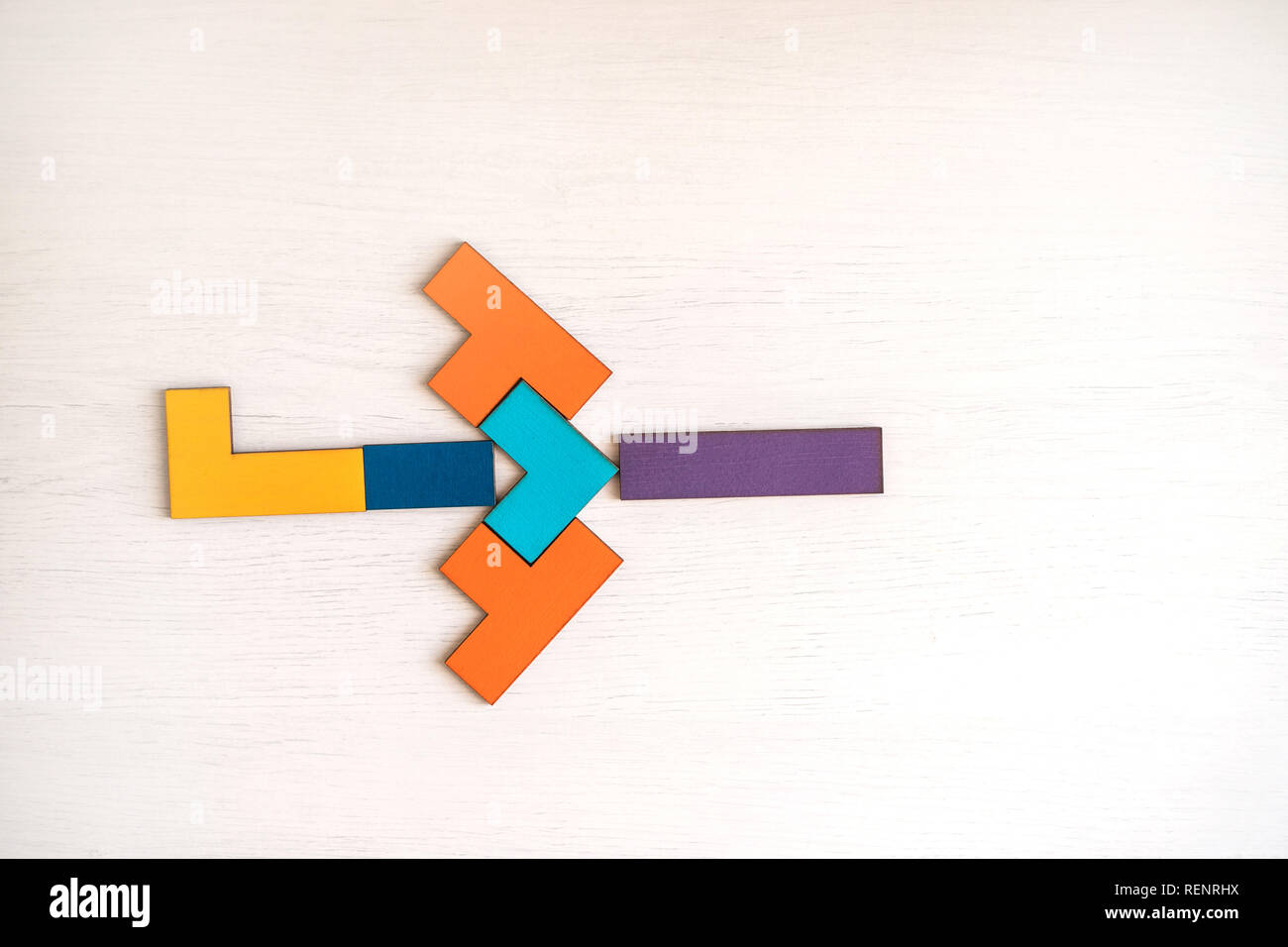 Plane made from tangram puzzle on table Stock Photo - Alamy