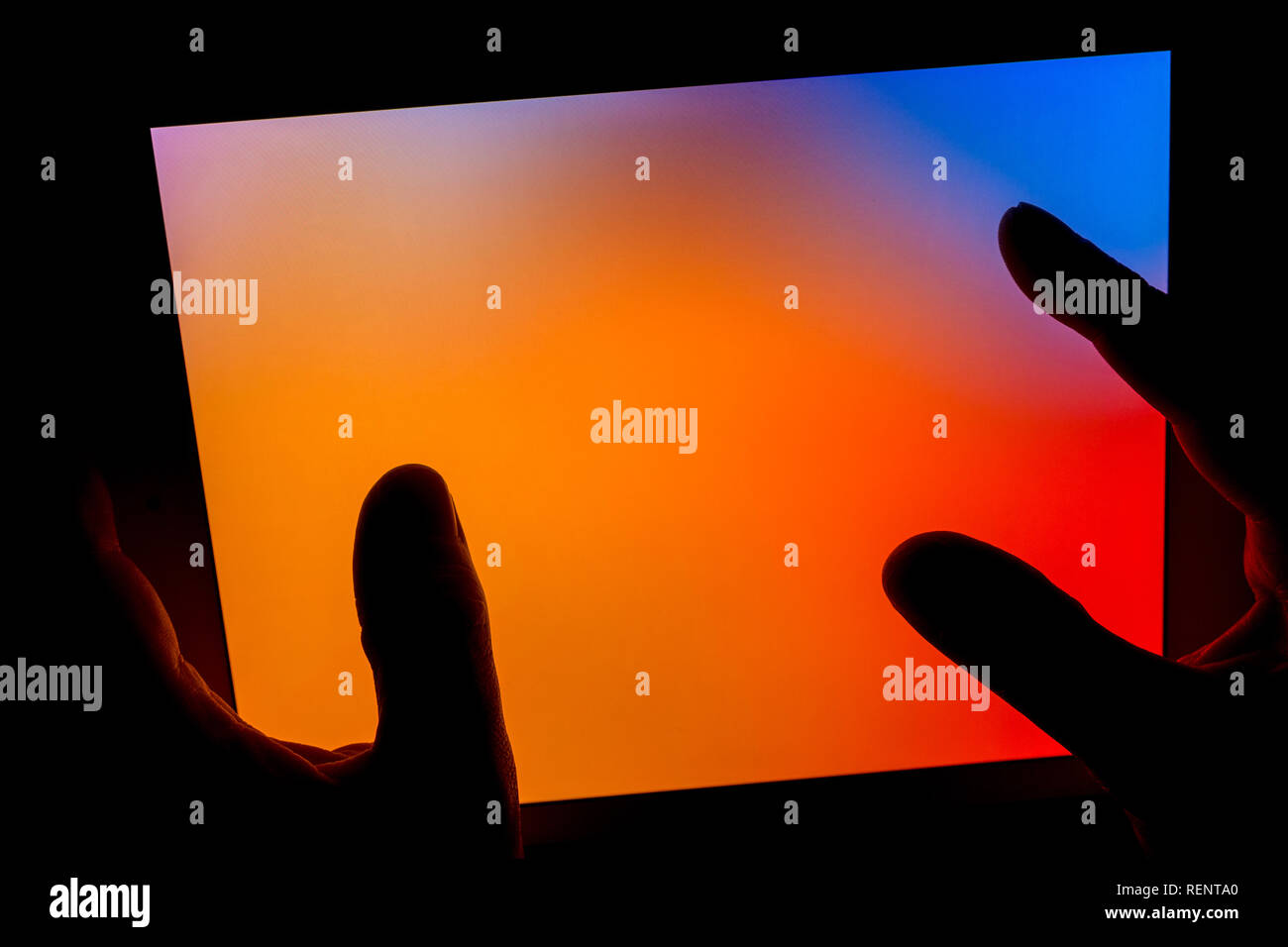 Hand using touch screen tablet business computer at night Stock Photo ...