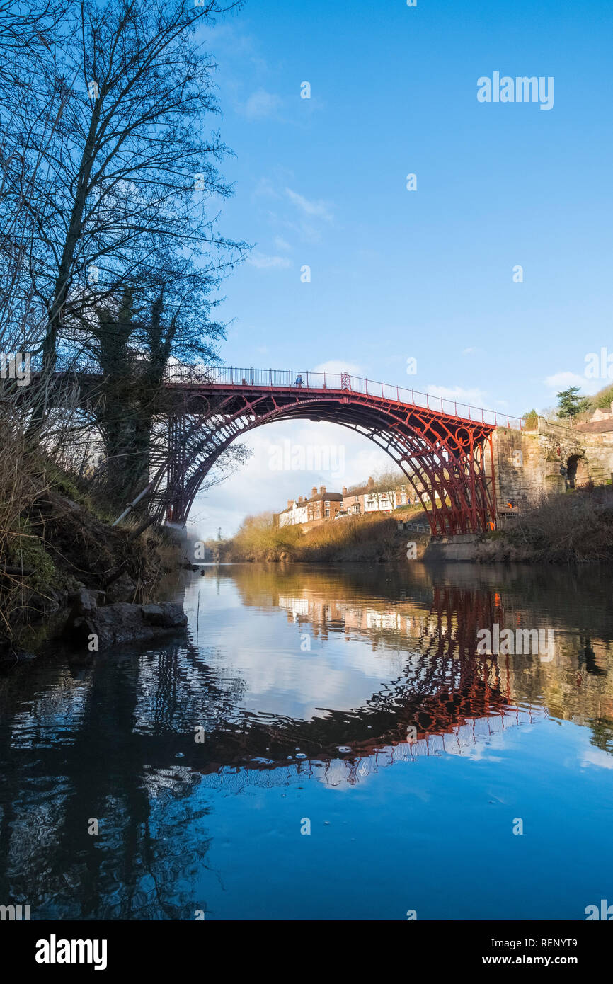 Winter sunlight on the red Iron Bridge at Ironbridge, Shropshire ...