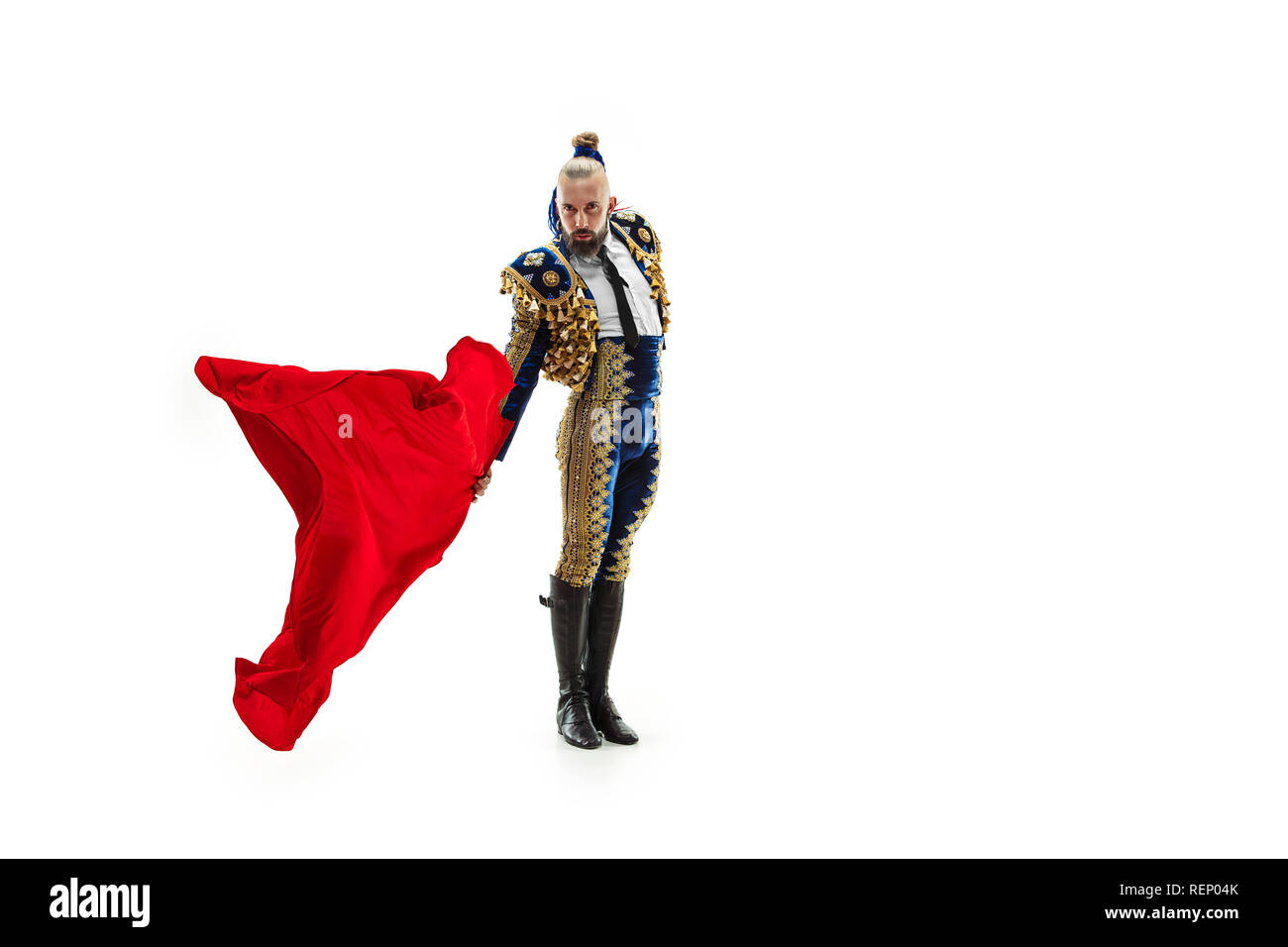 Torero in blue and gold suit or typical spanish bullfighter isolated ...