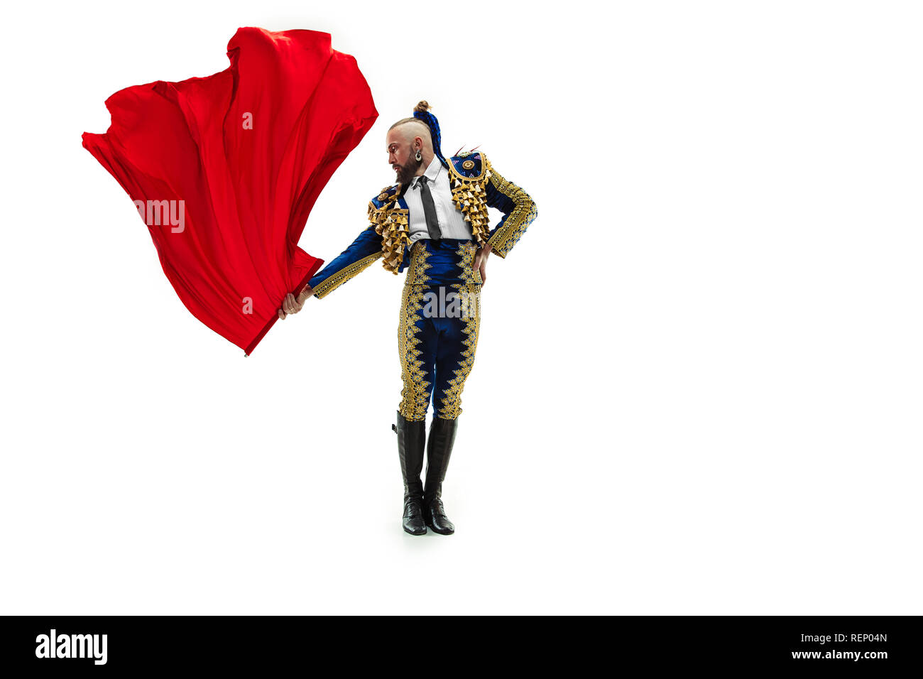 Torero in blue and gold suit or typical spanish bullfighter isolated ...