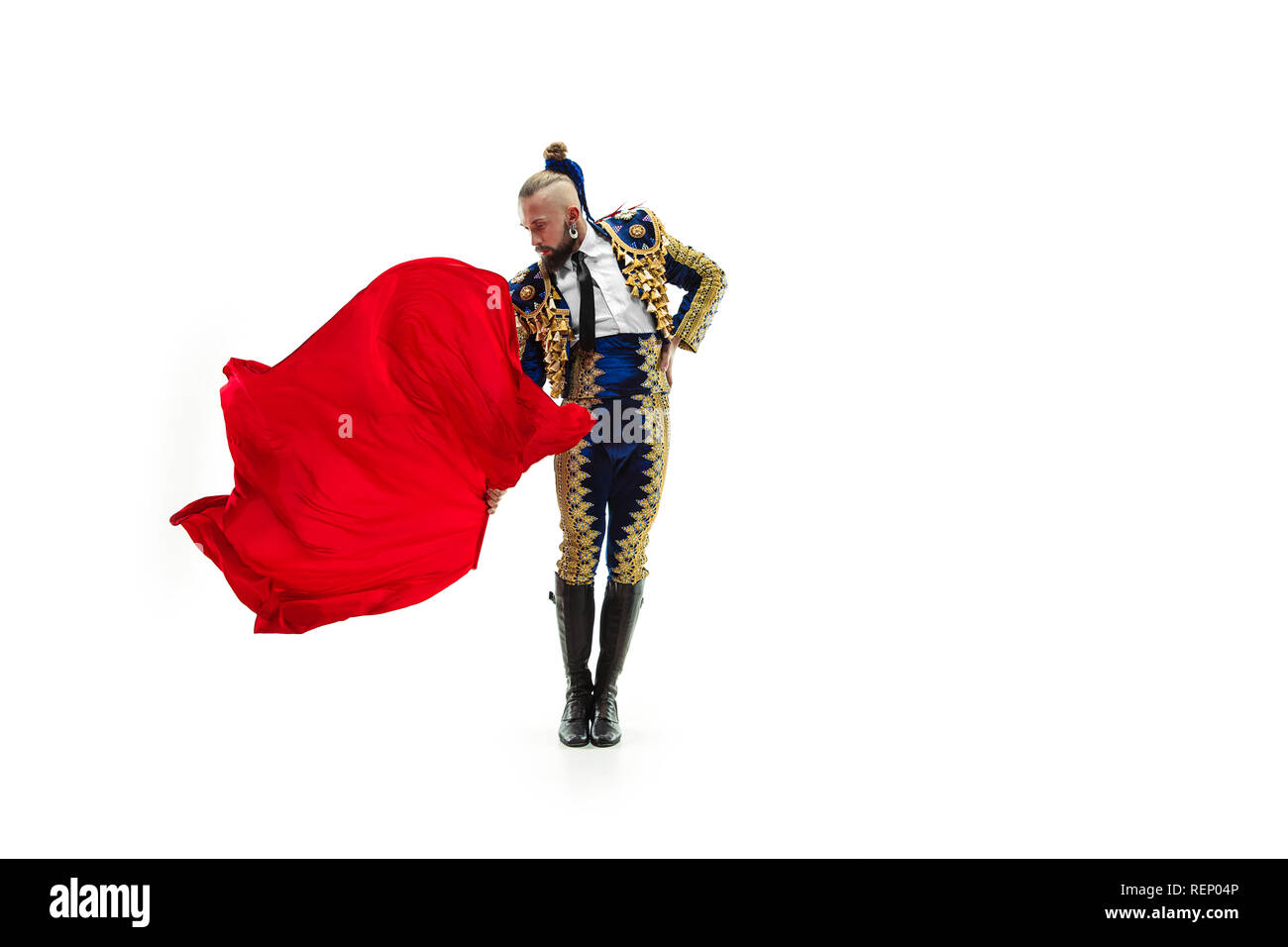 Torero in blue and gold suit or typical spanish bullfighter isolated ...