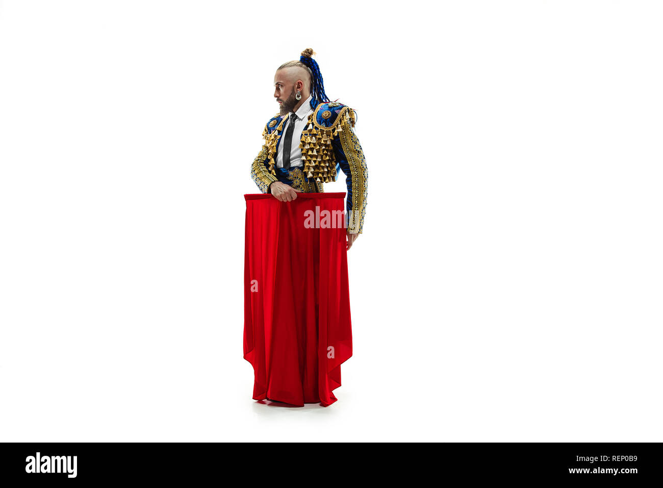Torero in blue and gold suit or typical spanish bullfighter isolated ...