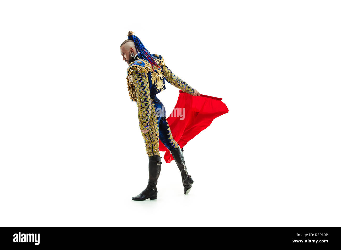 Torero in blue and gold suit or typical spanish bullfighter isolated ...