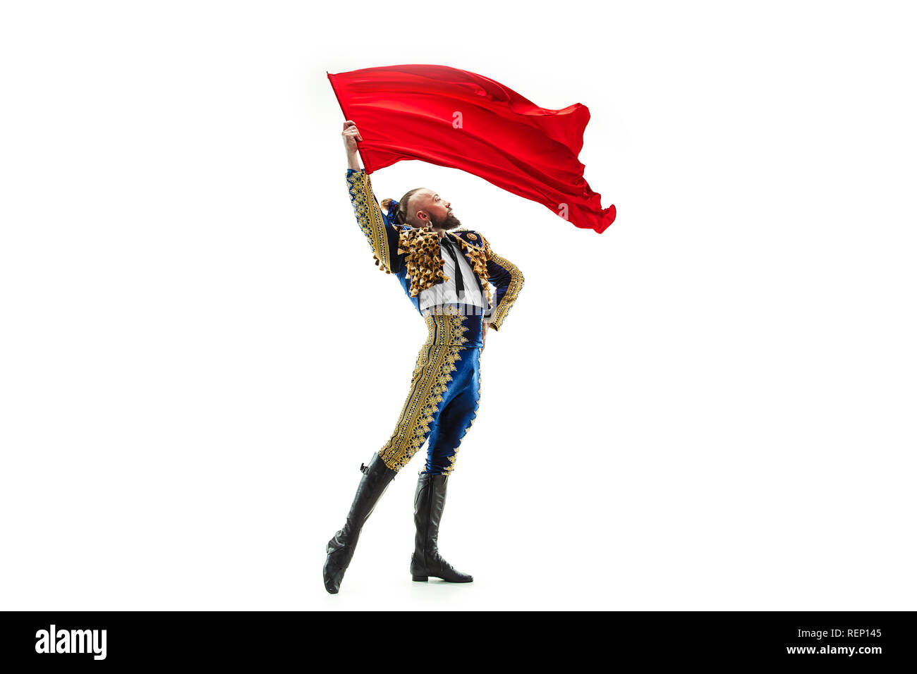 Torero in blue and gold suit or typical spanish bullfighter isolated ...