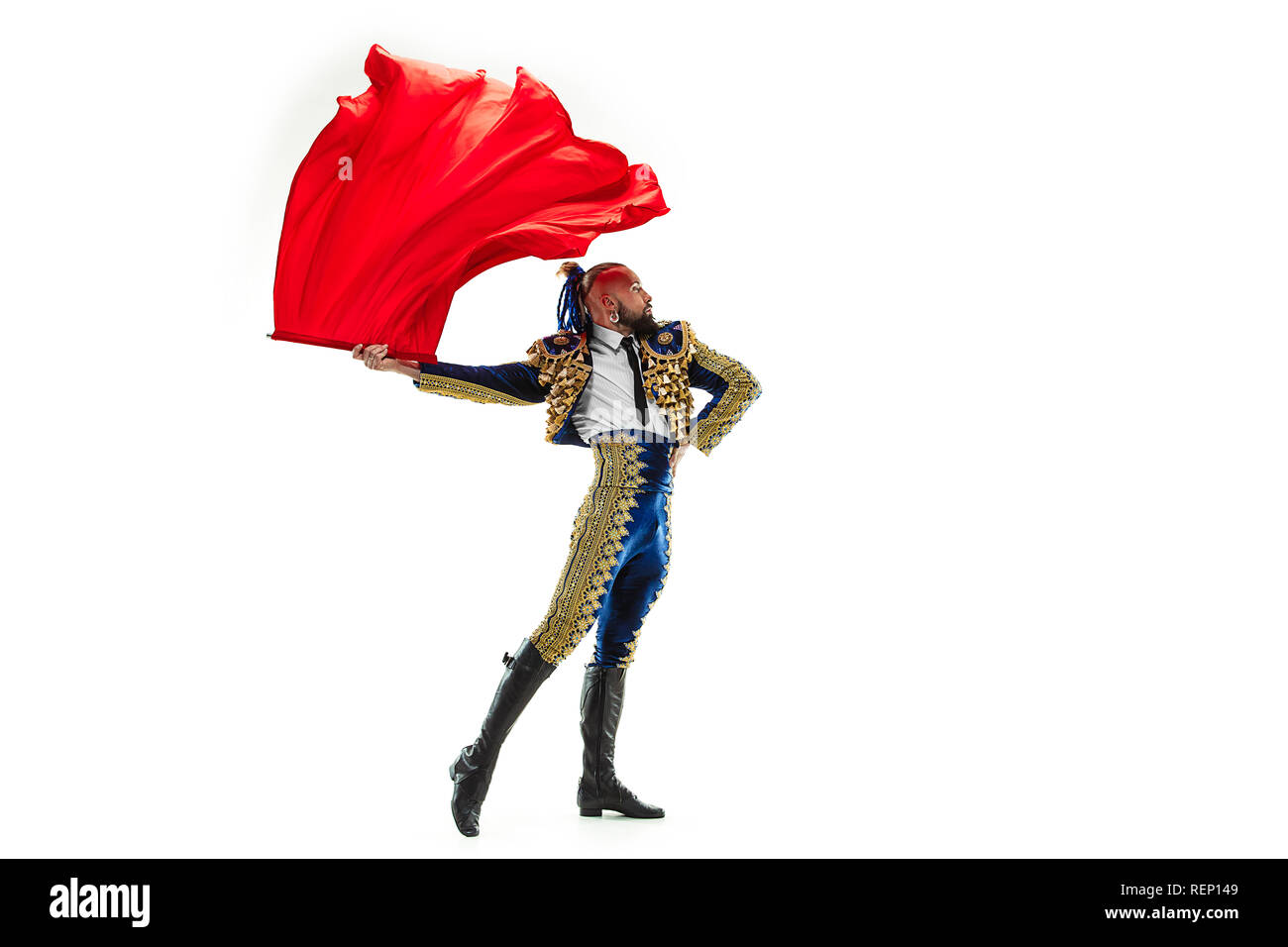 Torero in blue and gold suit or typical spanish bullfighter isolated ...