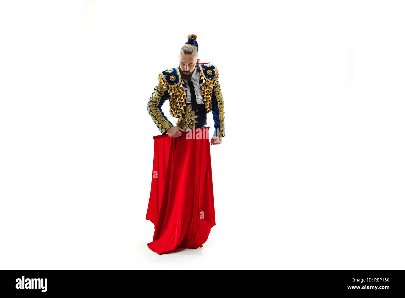 Torero in blue and gold suit or typical spanish bullfighter isolated ...