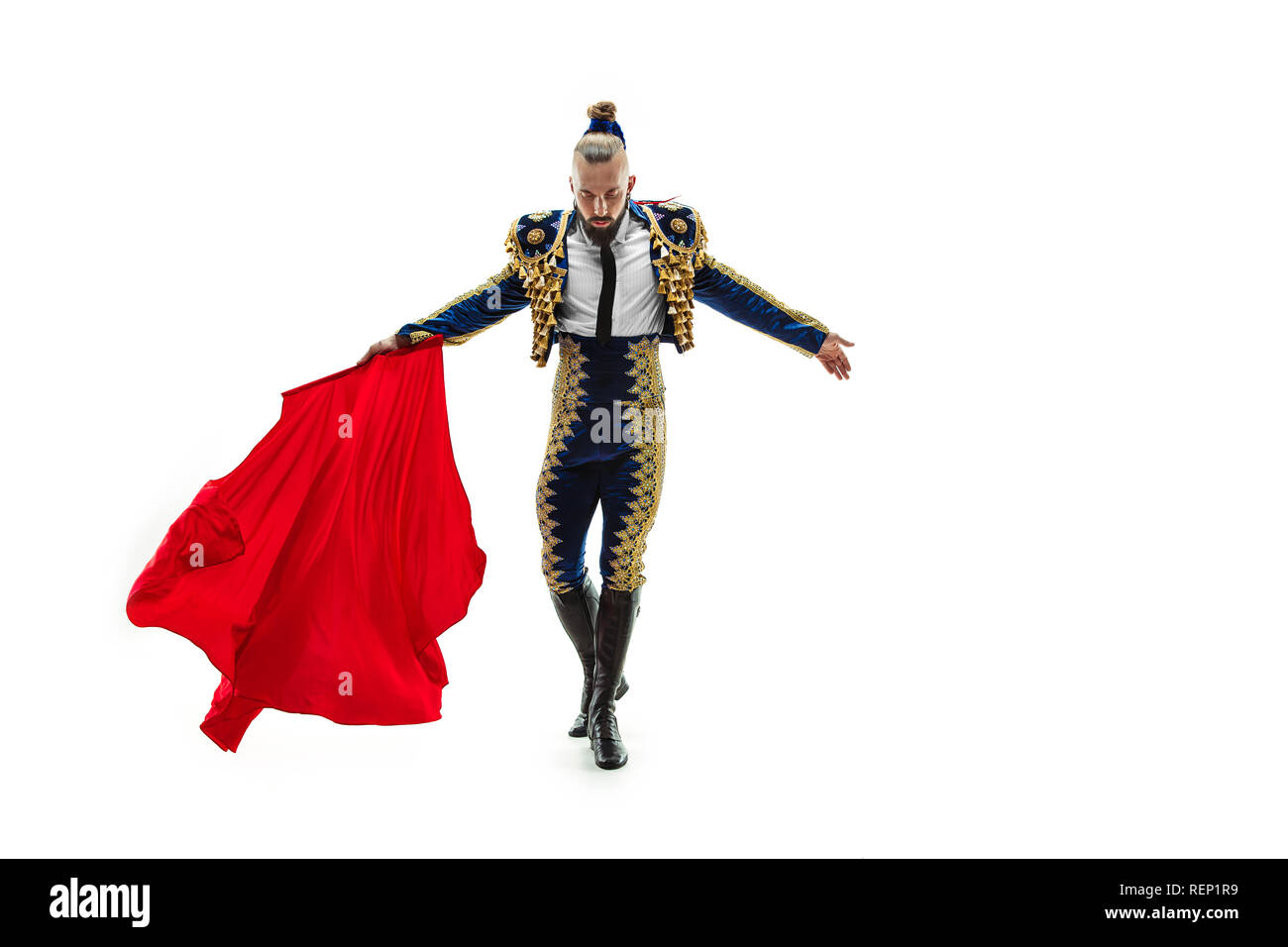 Torero in blue and gold suit or typical spanish bullfighter isolated ...