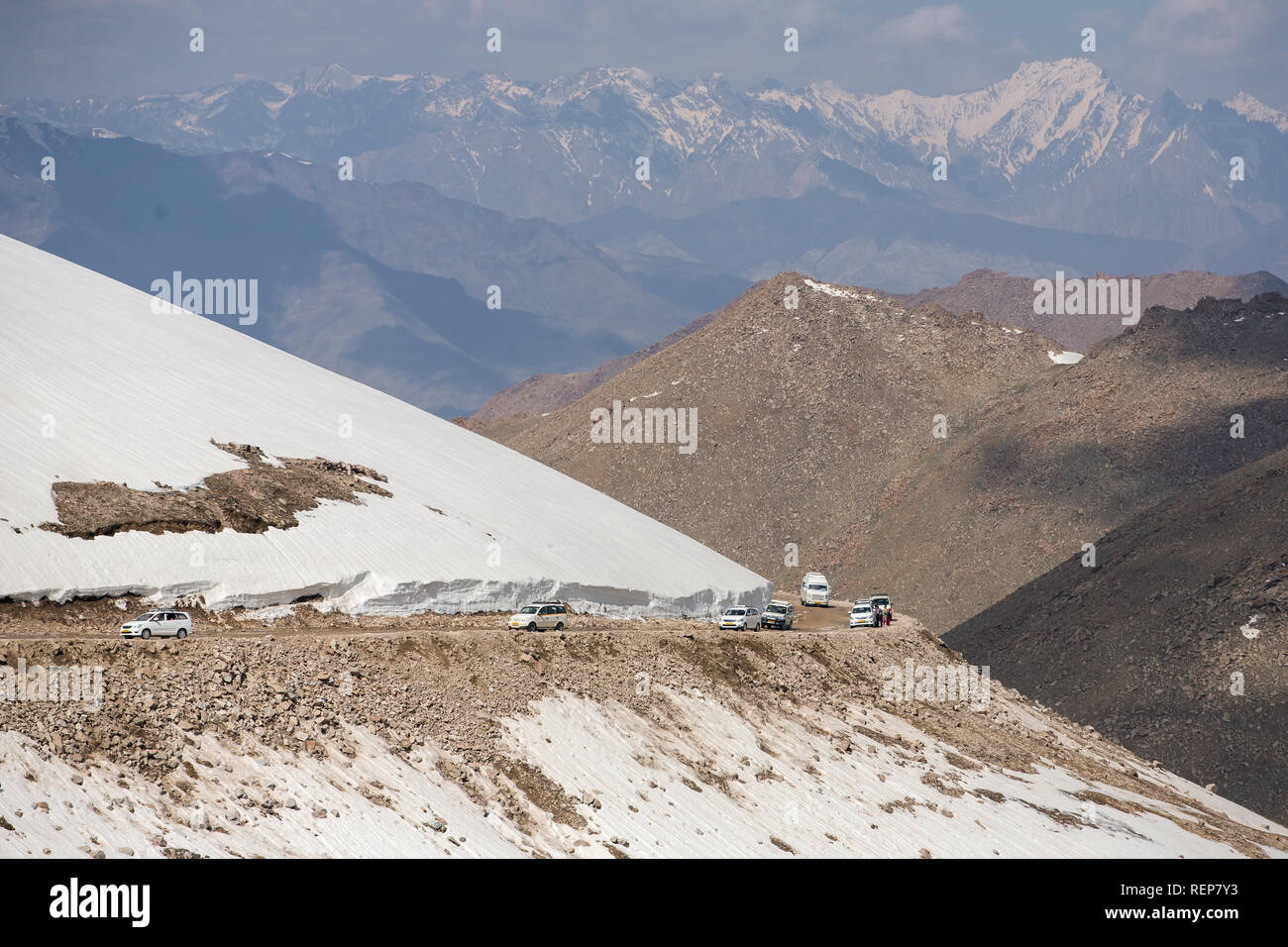 Traffic on high altitude road at Khardung La pass, Ladakh, India. The ...