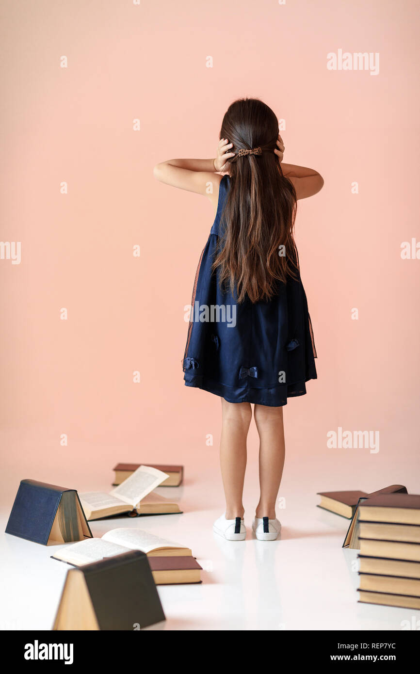 Little Girl Very Sad Reading High Resolution Stock Photography and ...