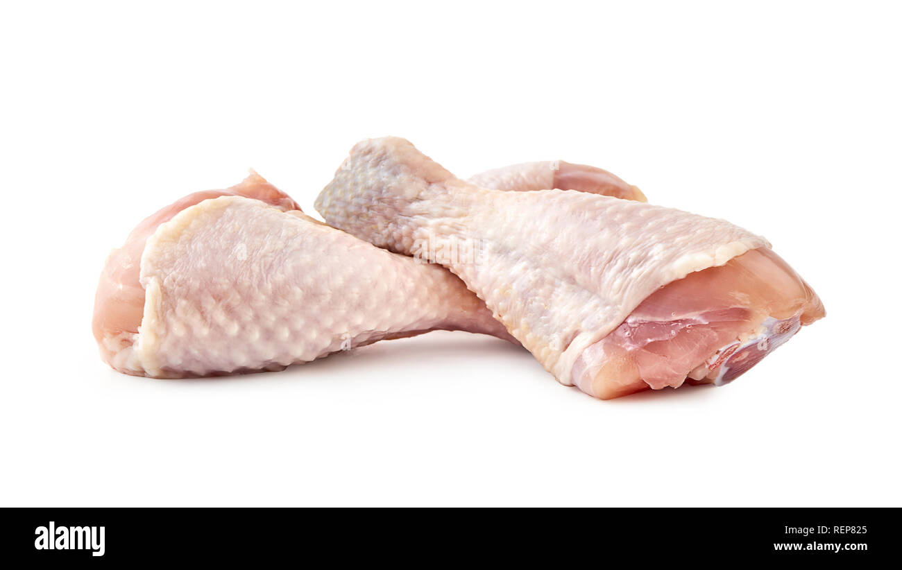 Raw chicken legs isolated on white background Stock Photo - Alamy