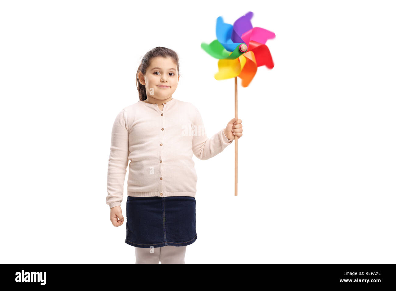 Girl with a pinwheel hi-res stock photography and images - Alamy