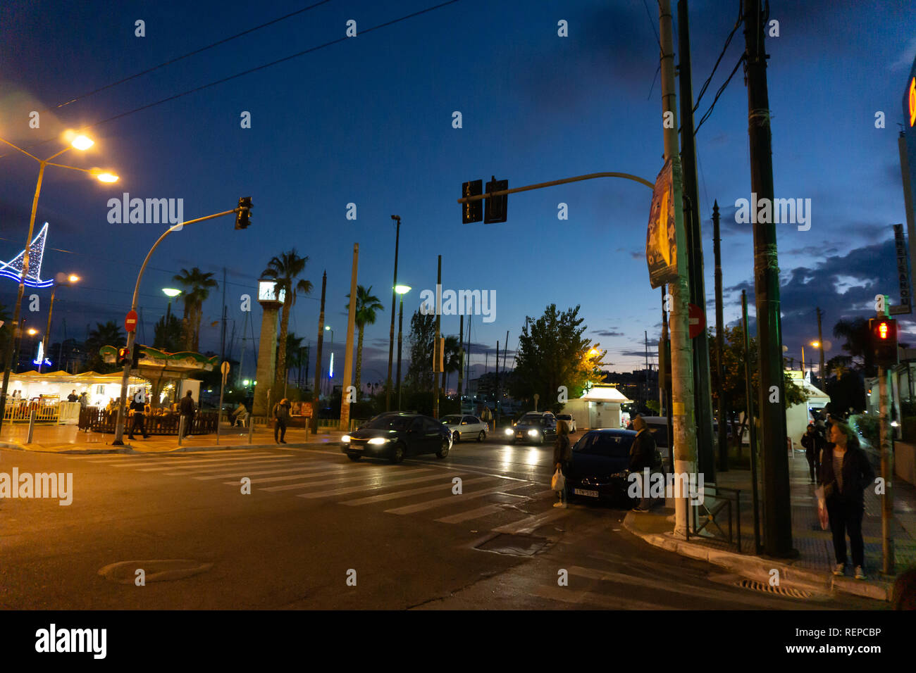 The port of Piraeus was always busy and lively at night Stock Photo - Alamy