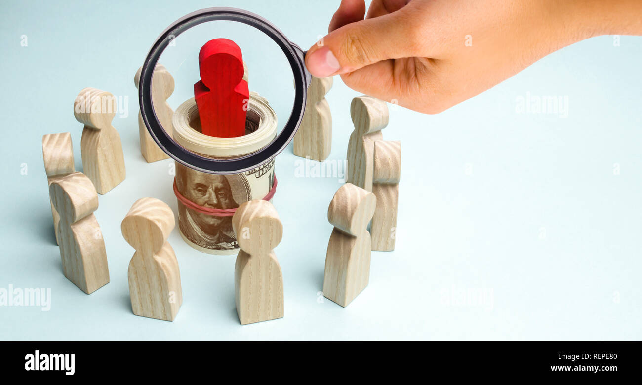 The concept of a business leader. The boss stands in the center of the ...