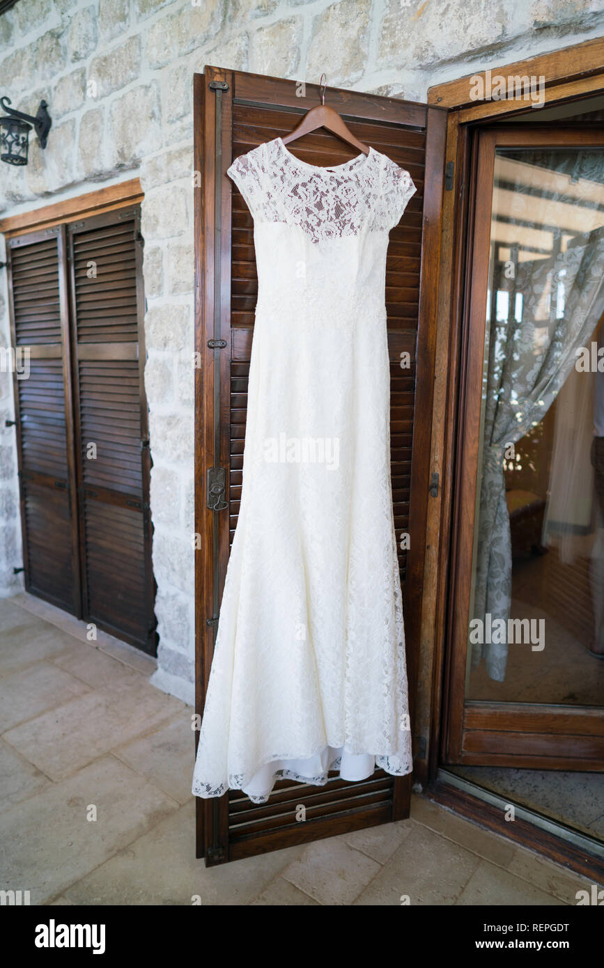 Hanging up a dress hi-res stock photography and images - Alamy