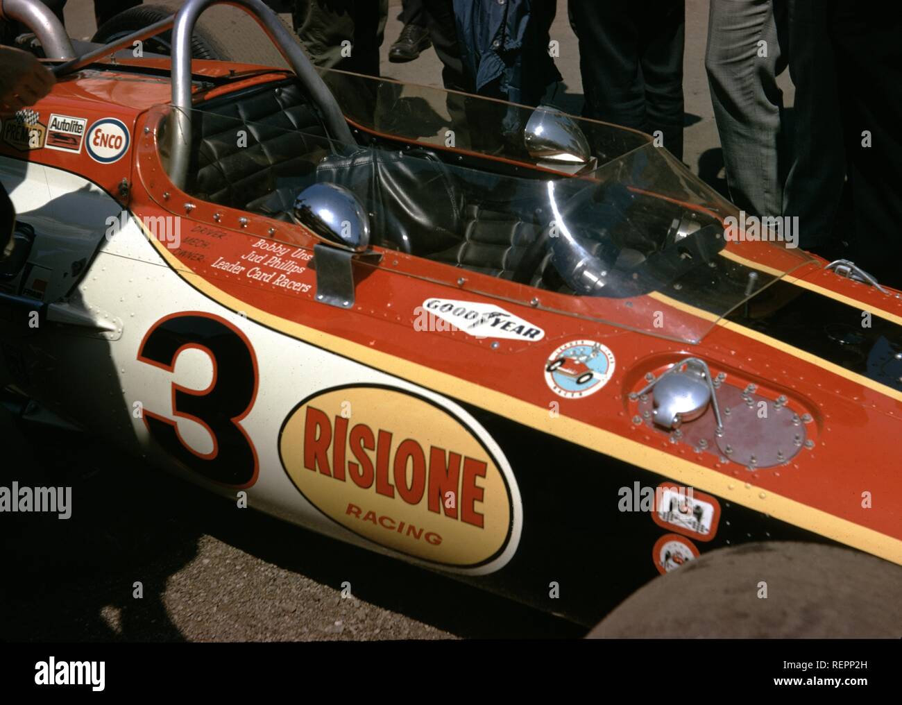 Close-up of race car driver by Bobby Unser for Rislone Racing, in a pit ...