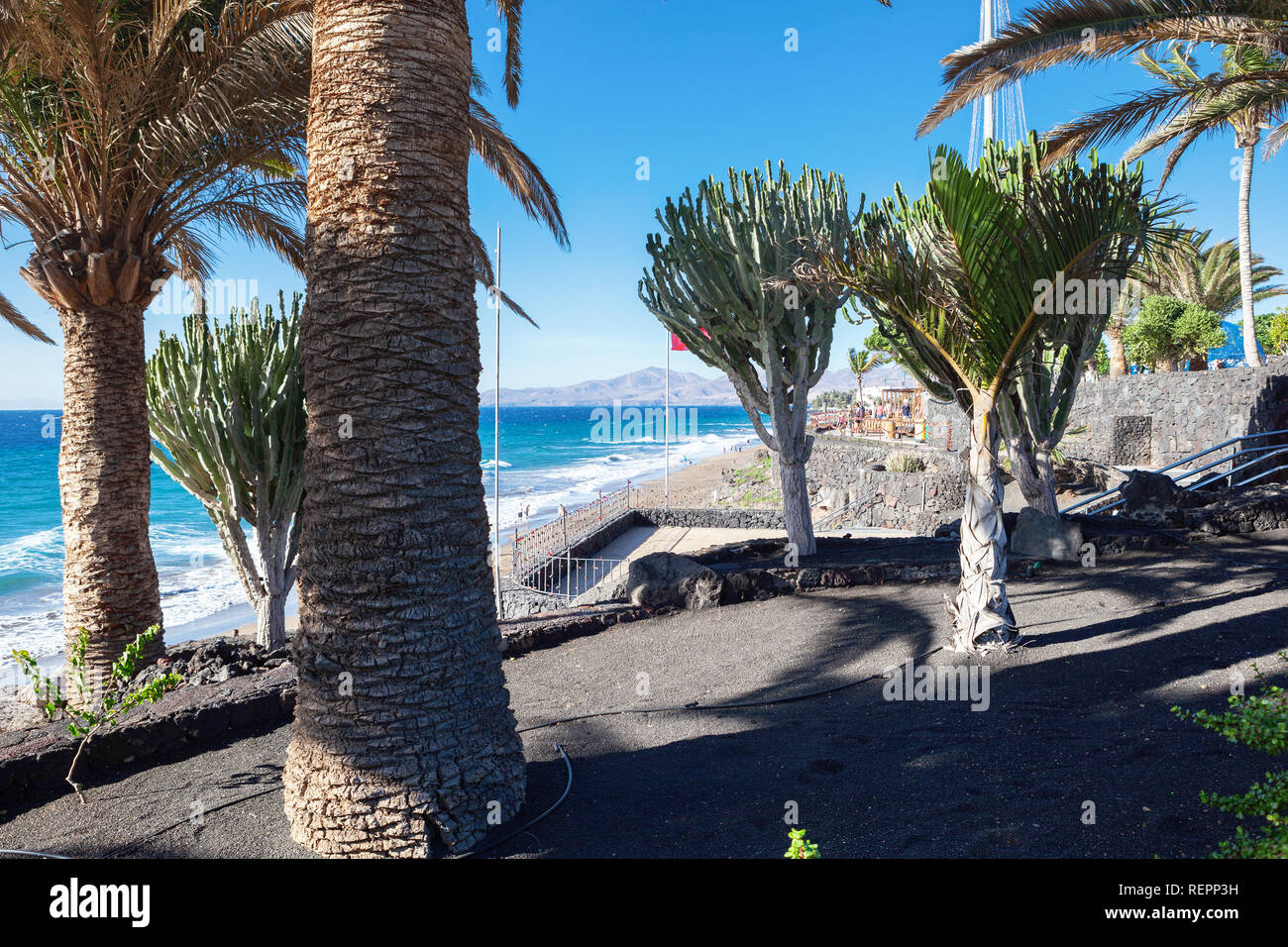 Puerto del Carmen beach in Lanzarote, Canary islands, Spain. blue sea ...