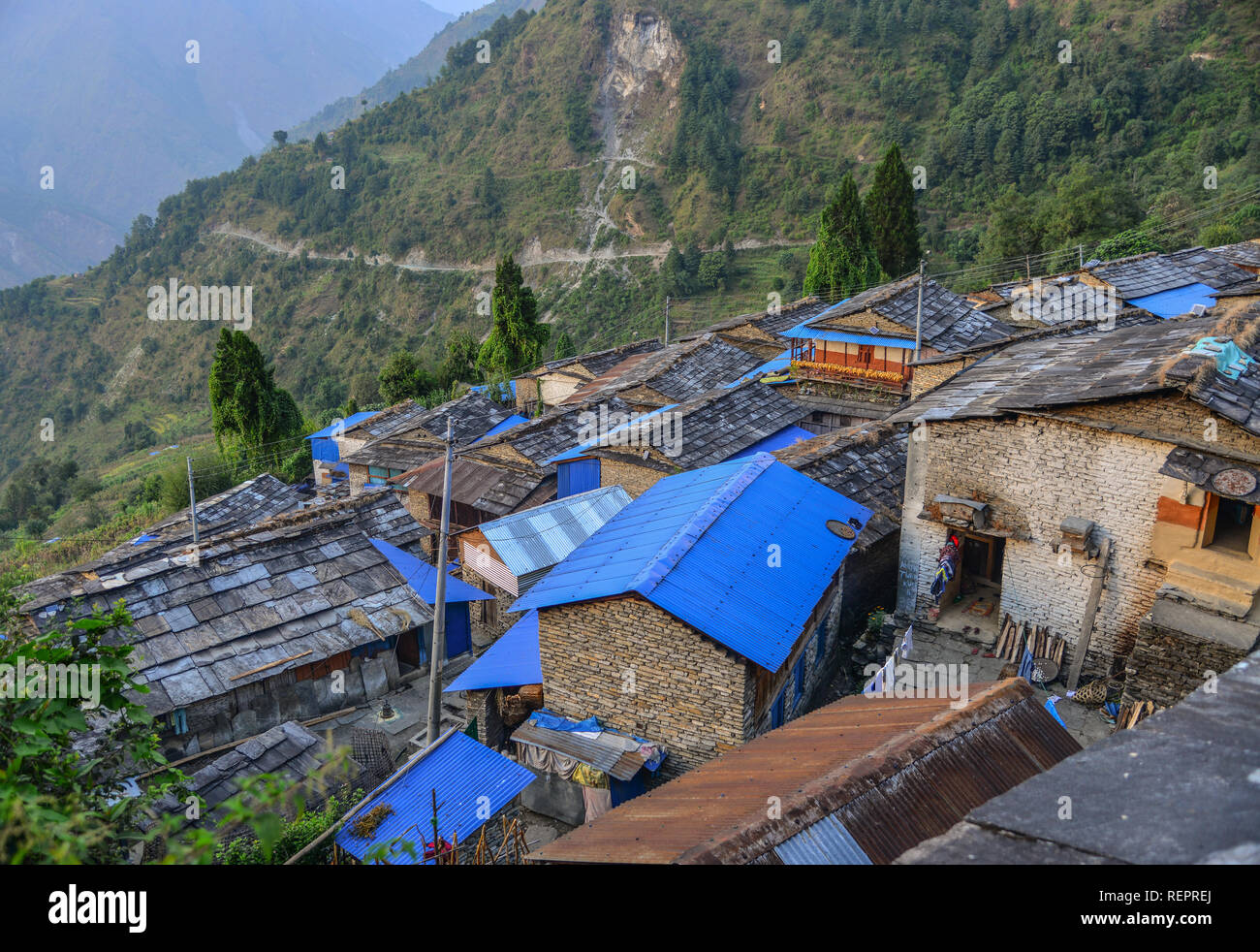 Ancient village with many stone houses on the hill in Nepal Stock Photo ...