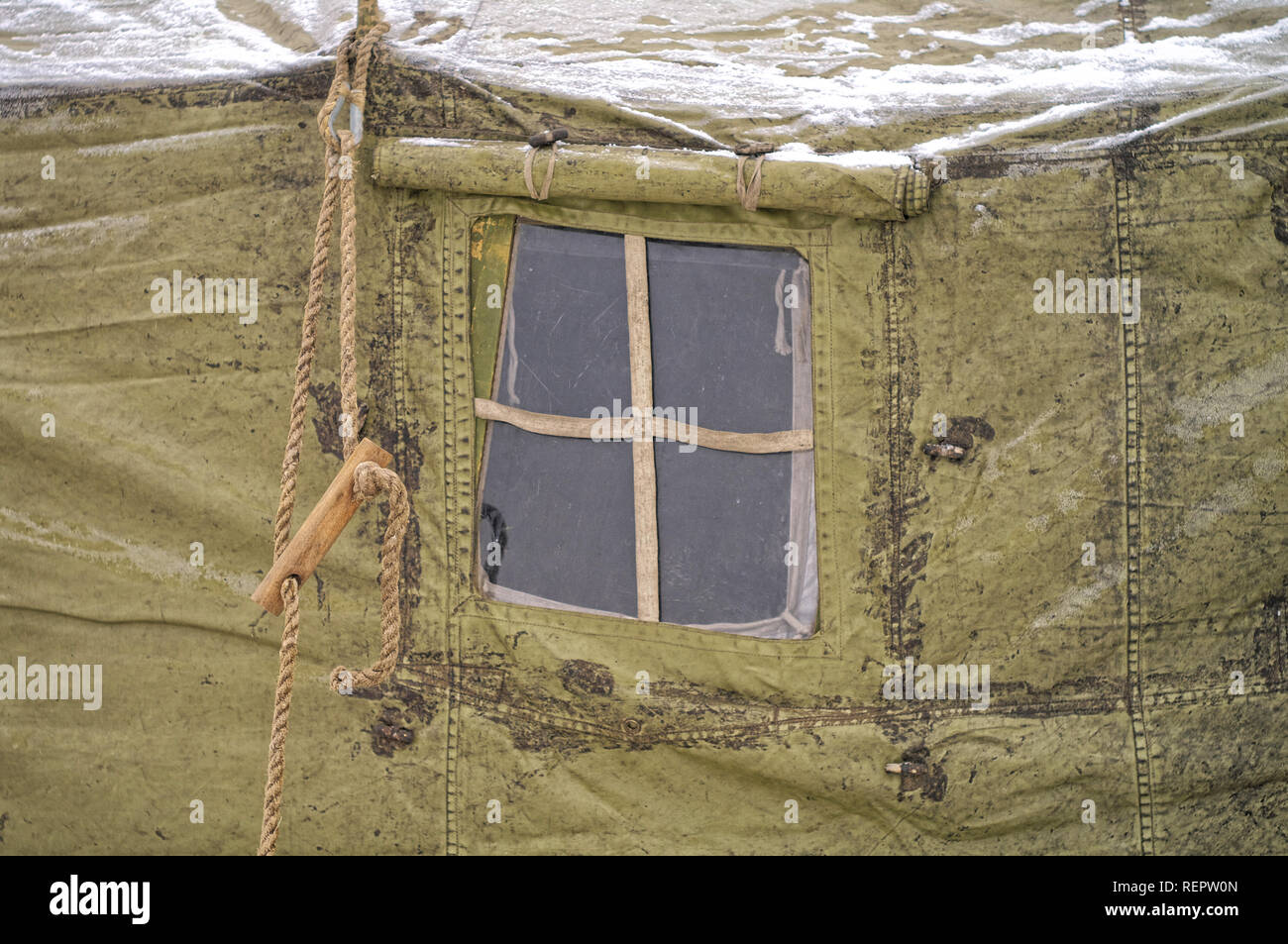 window military tents in winter. chimney, smoke, heating tents. canvas ...